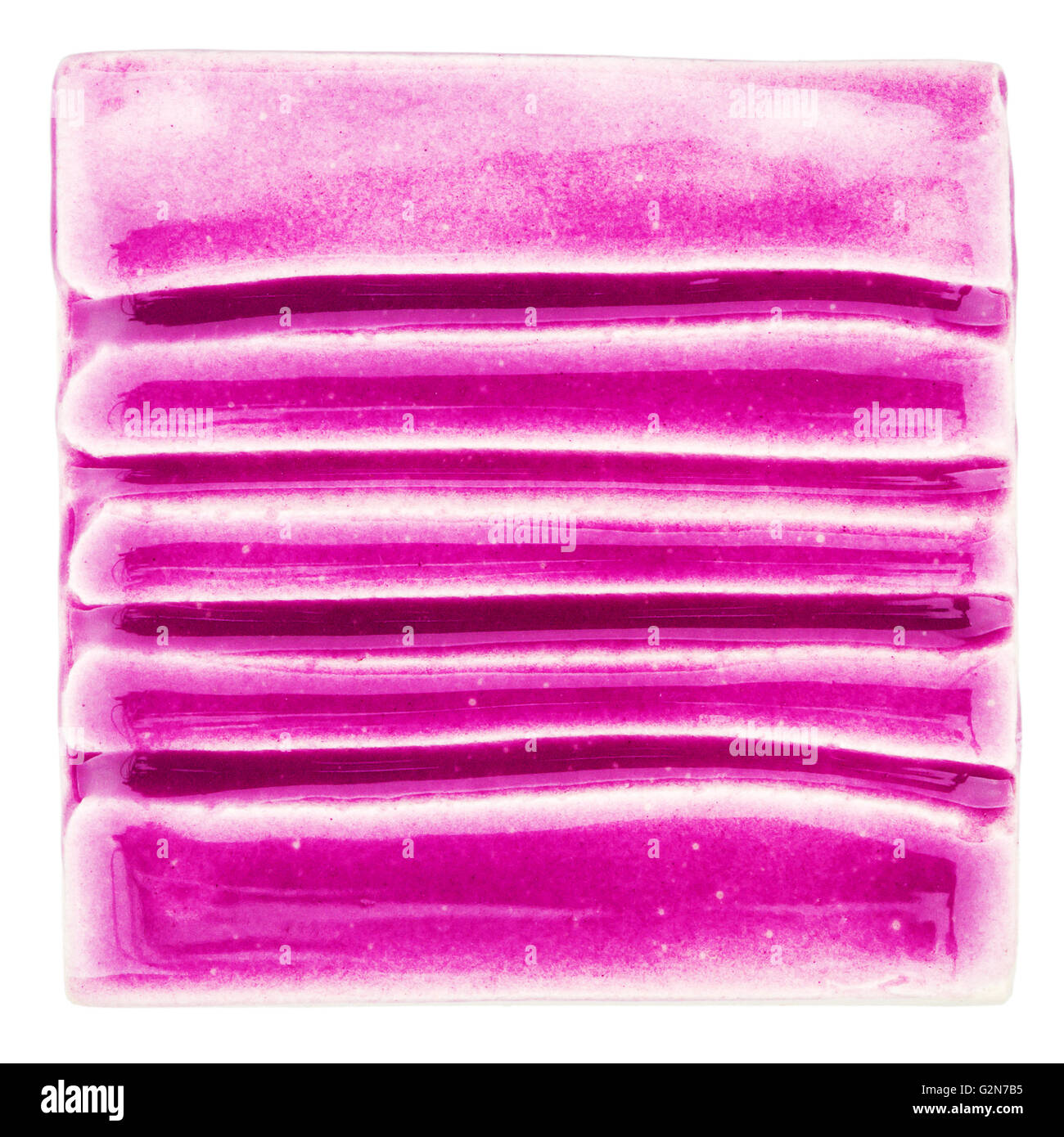 Purple lined handmade glazed ceramic tile isolated on white background ...