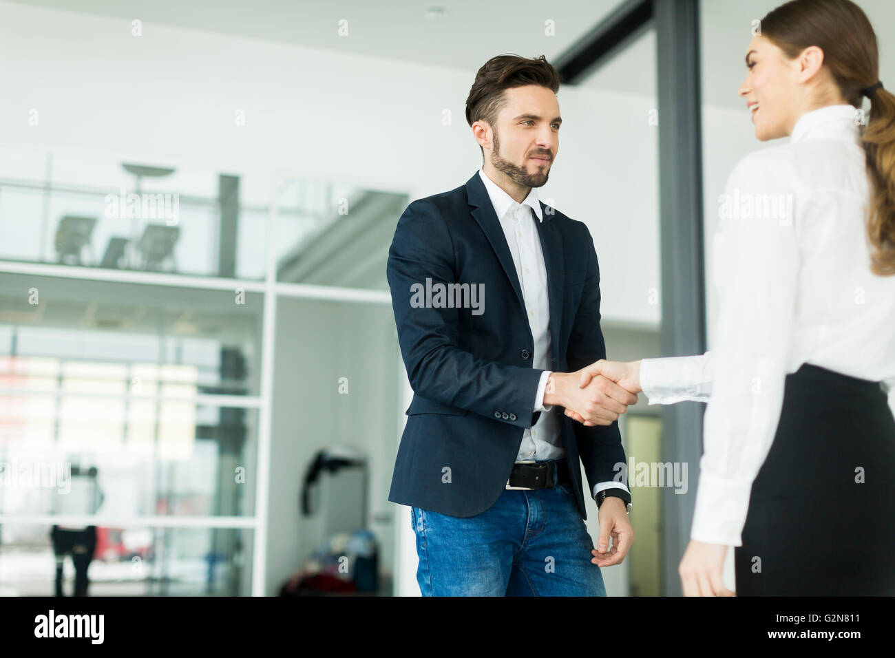 Business people shaking hands in the office Stock Photo - Alamy