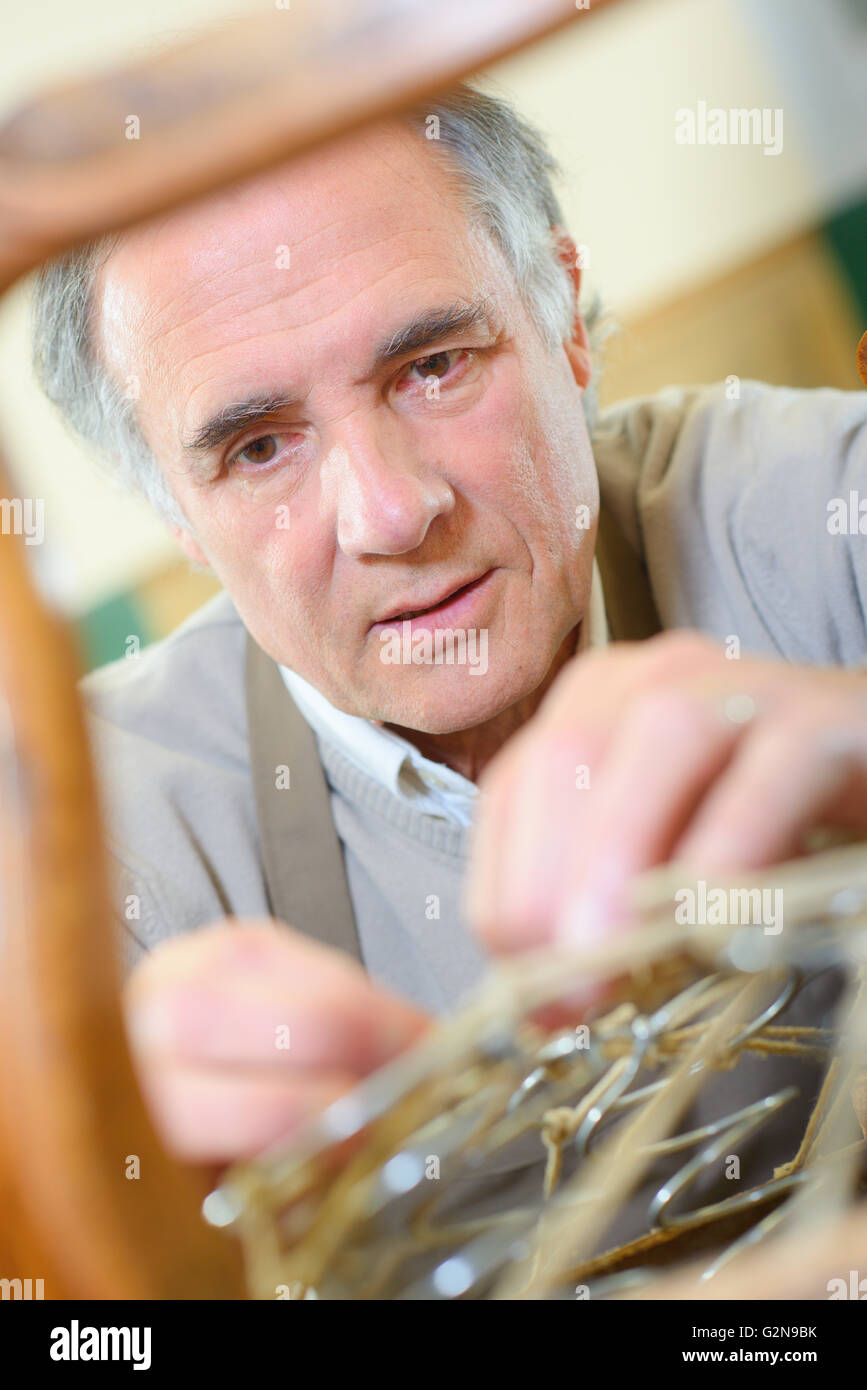 Repairing an antique chair Stock Photo - Alamy