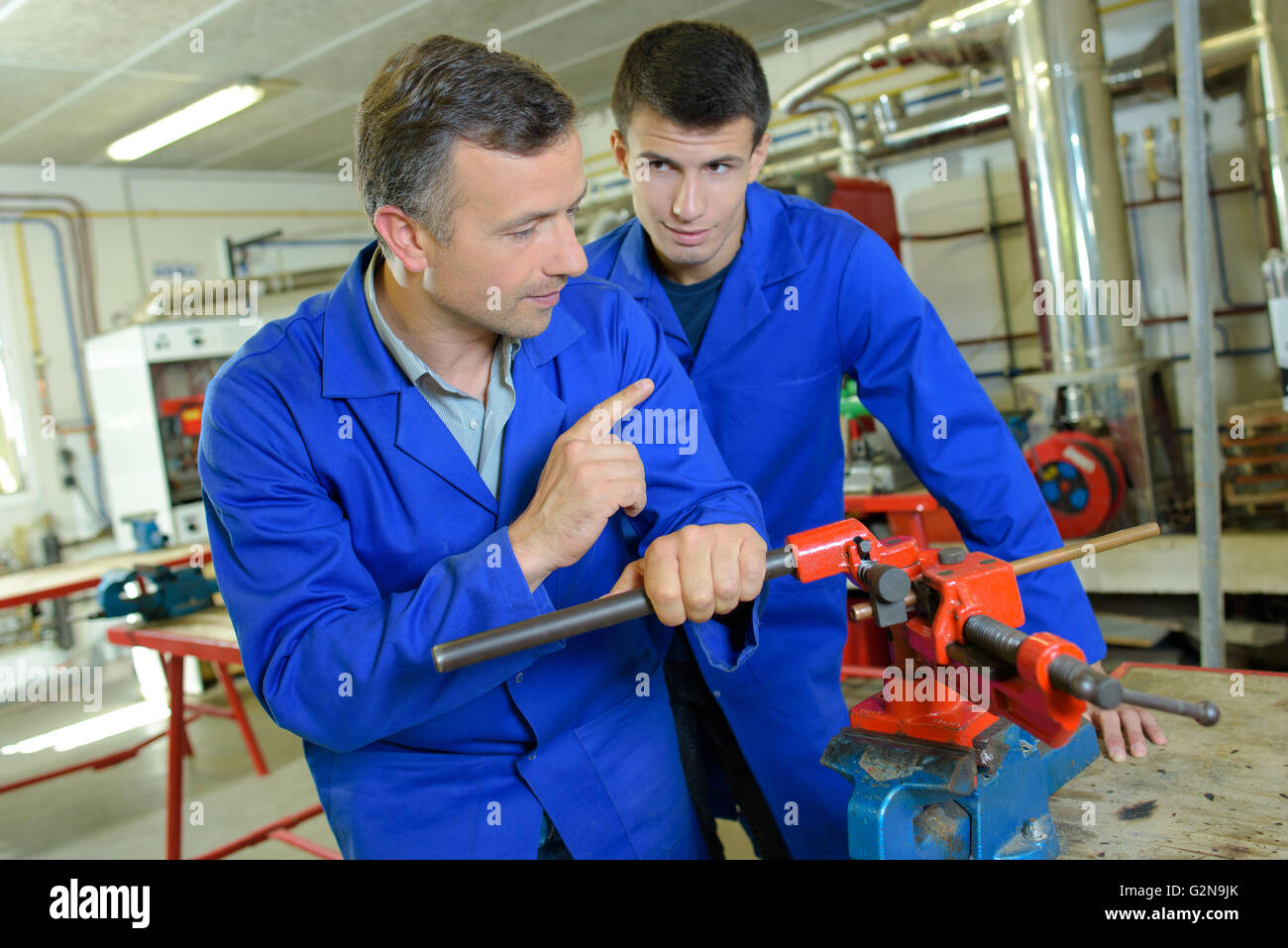 Man giving instructions young hi-res stock photography and images - Alamy