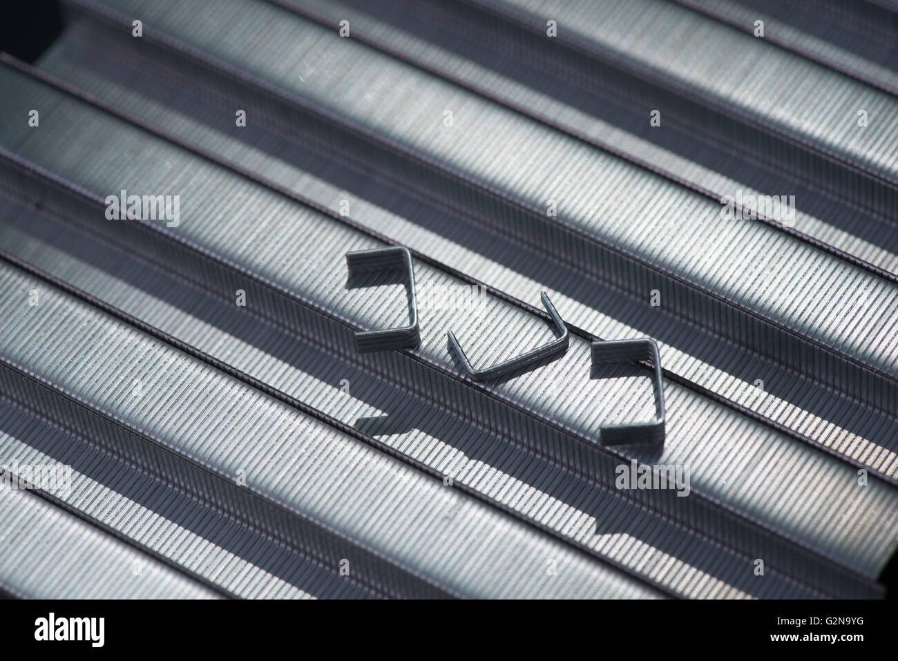 Metal Staples on table Stock Photo - Alamy