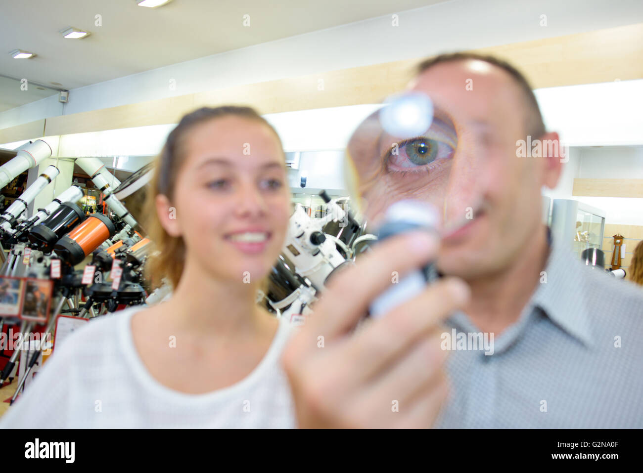 Magnifying glass reading adult hi-res stock photography and images - Alamy