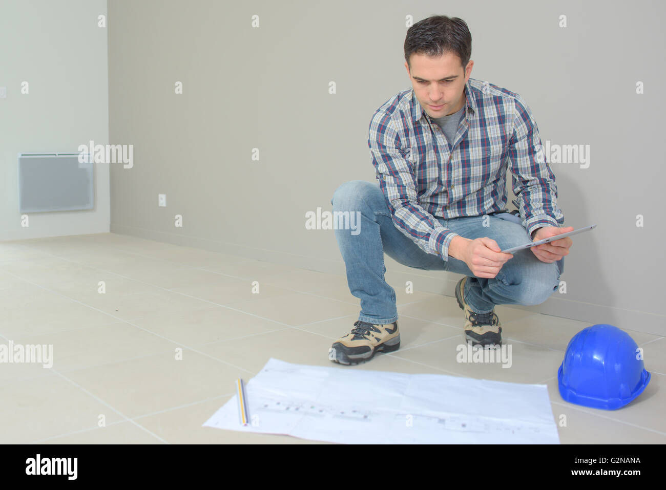Builder plans hi-res stock photography and images - Alamy