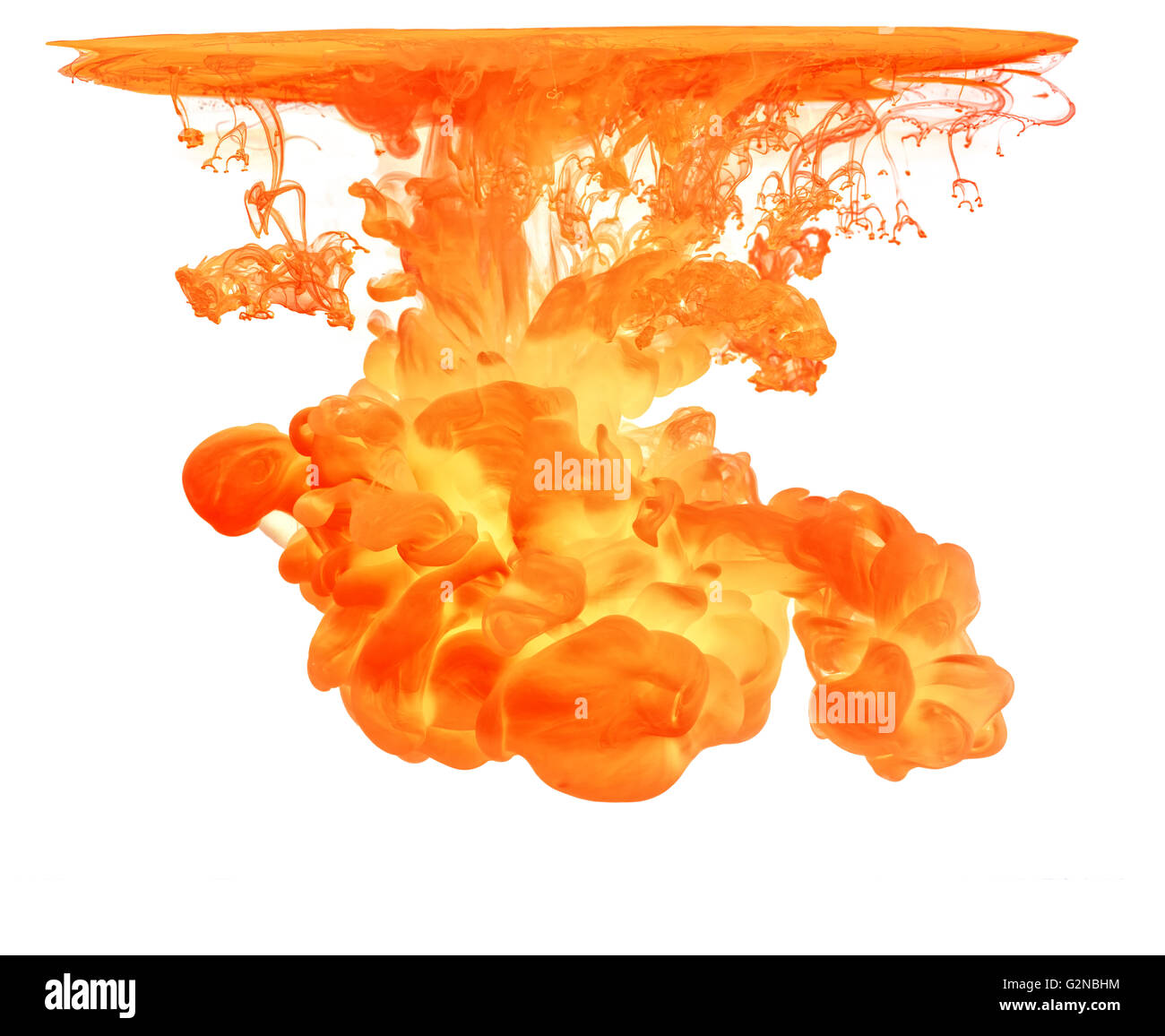 Colored ink in water creating abstract shape, isolated on white ...