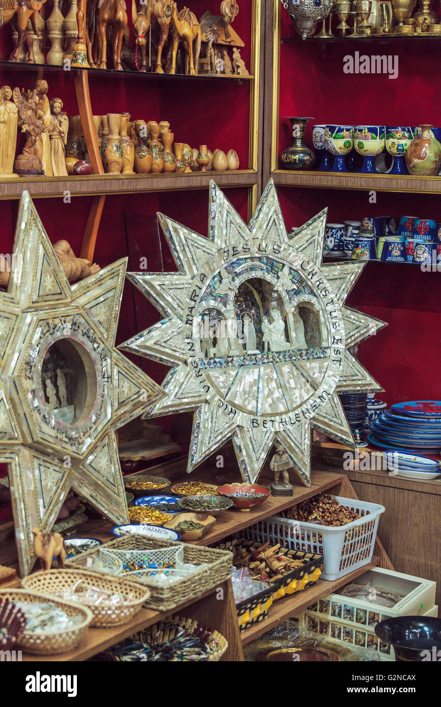 BETHLEHEM, ISRAEL - FEBRUARY 19, 2013: Walls of souvenir shop with ...