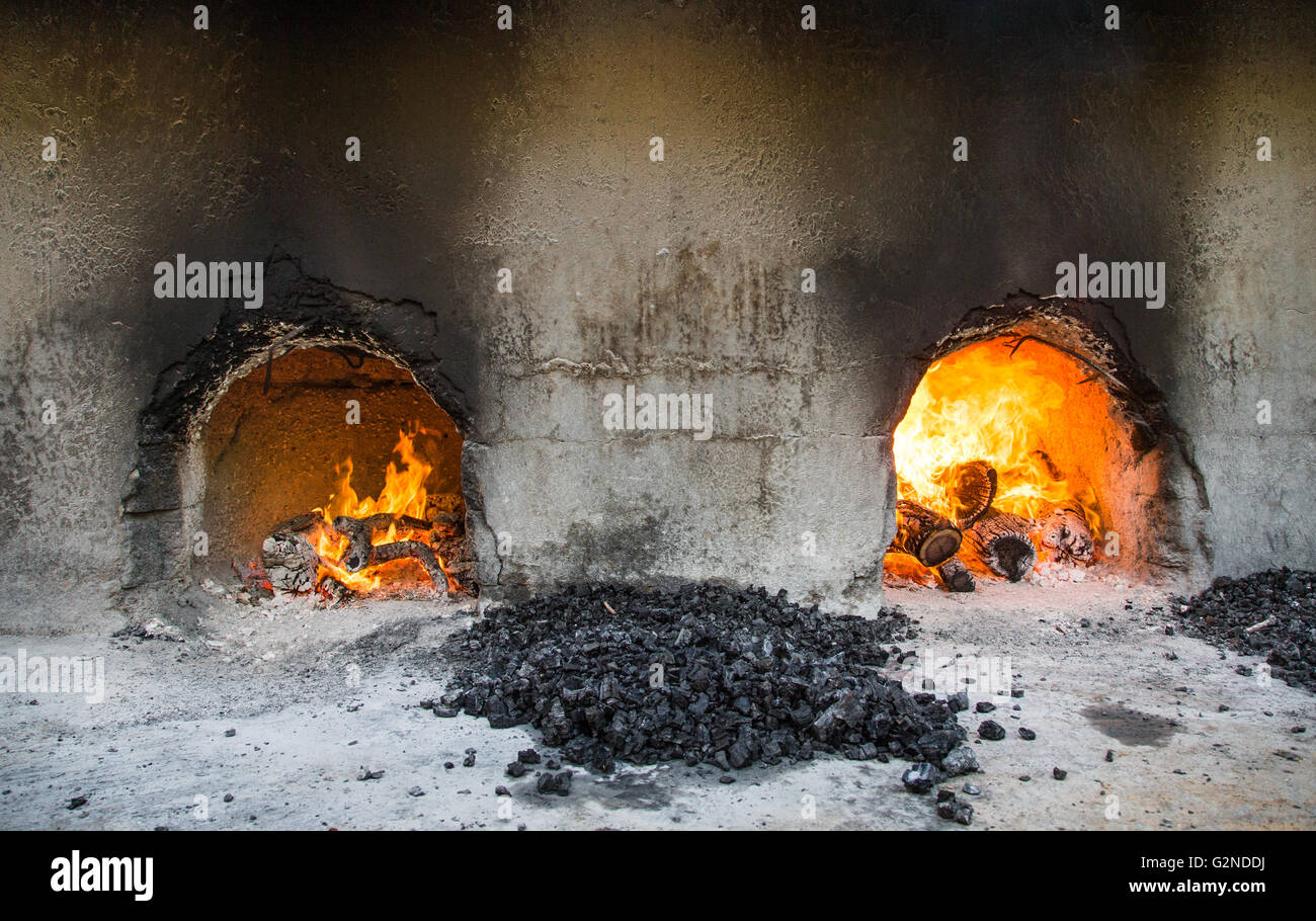 Fire under cooking halwa in a halwa factory in Nizwa, Oman Stock Photo ...