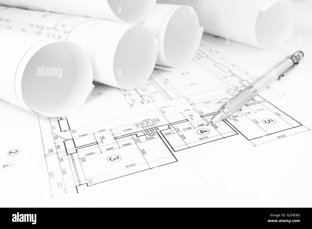 Rolls of architectural house plans and technical drawings Stock Photo ...