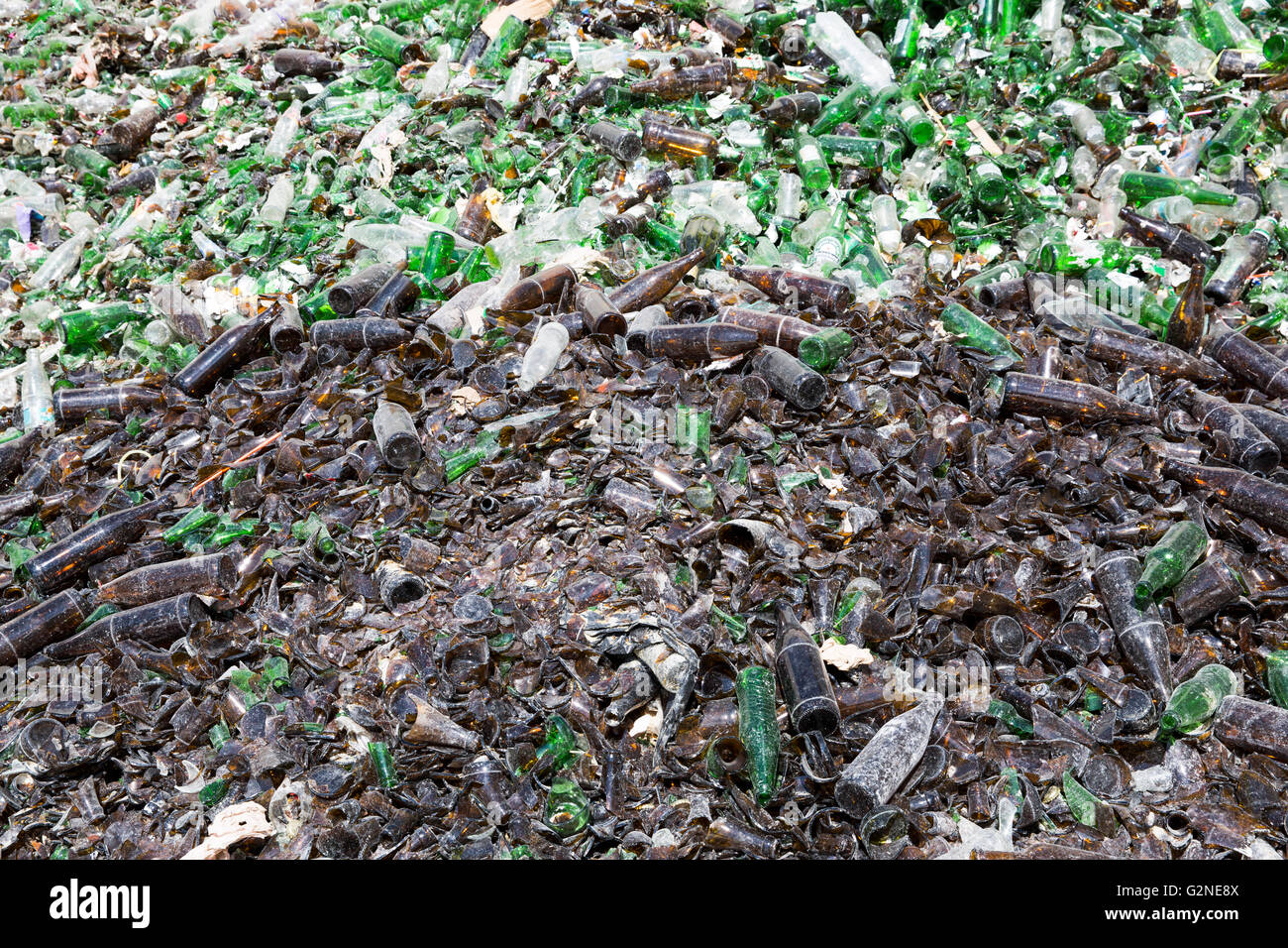 Glass waste for recycling in a recycling facility. Different glass ...