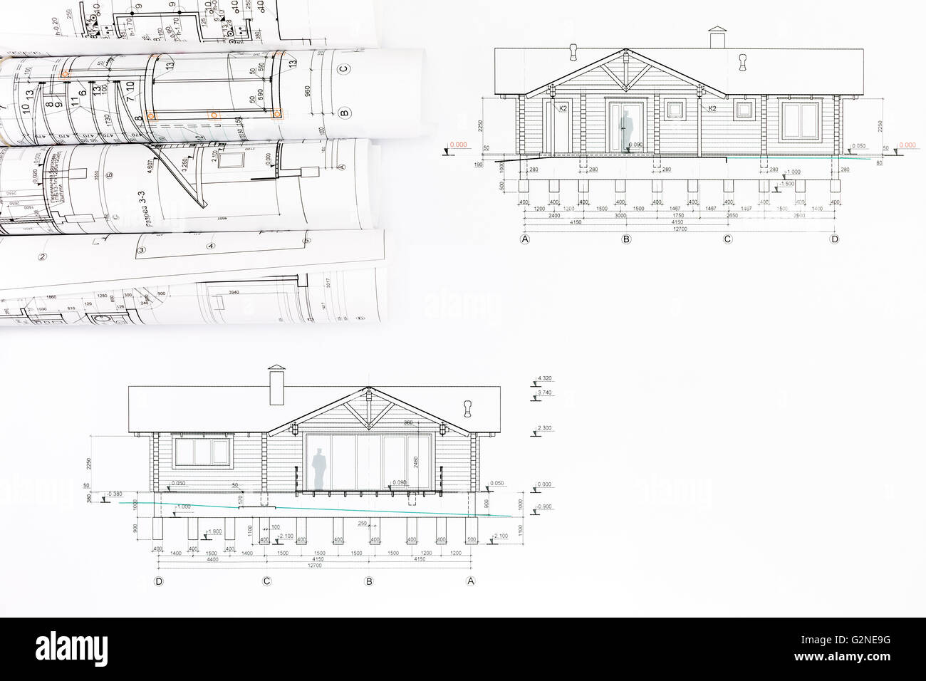 rolls of blueprints and architectural drawings of new house Stock Photo ...