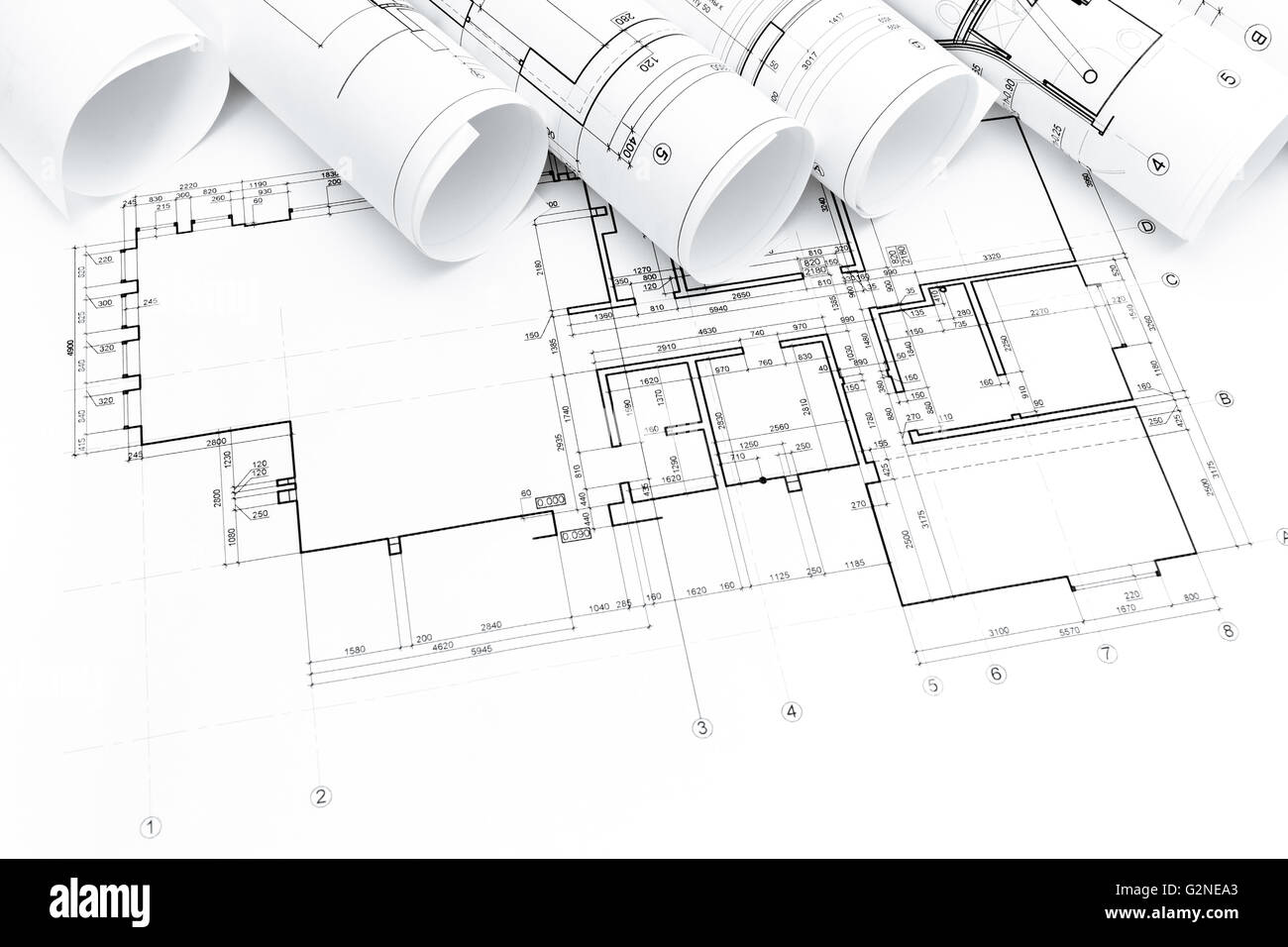 architect's workspace with rolls of plans and technical drawings Stock ...