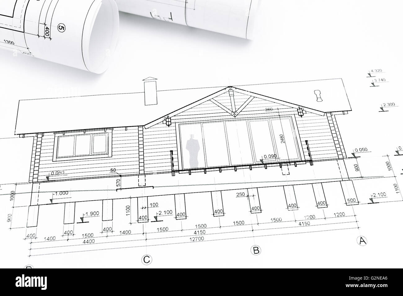 architect's workspace with rolls of plans and technical drawings Stock ...
