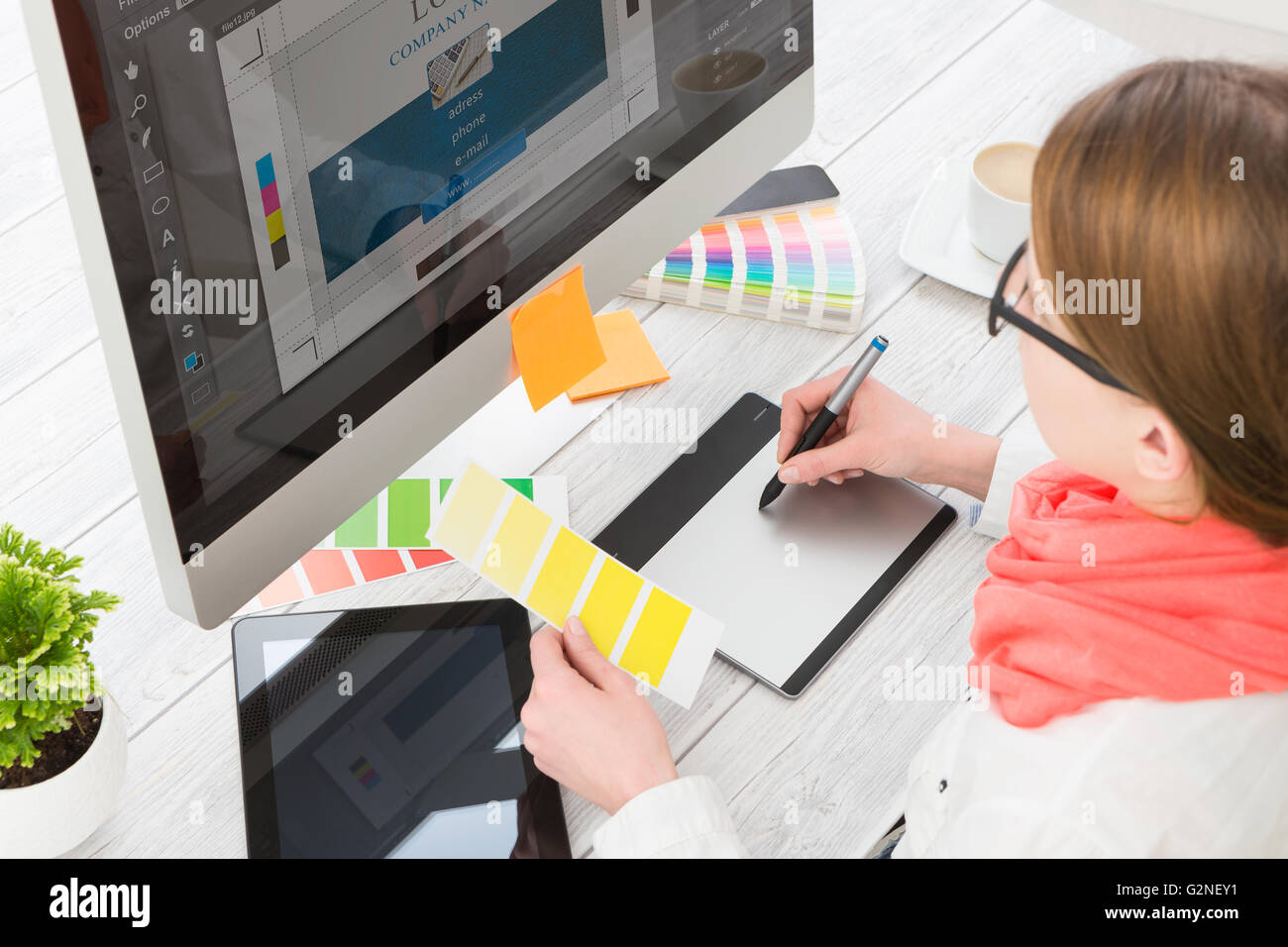 Graphic designer at work. Color swatch samples Stock Photo - Alamy