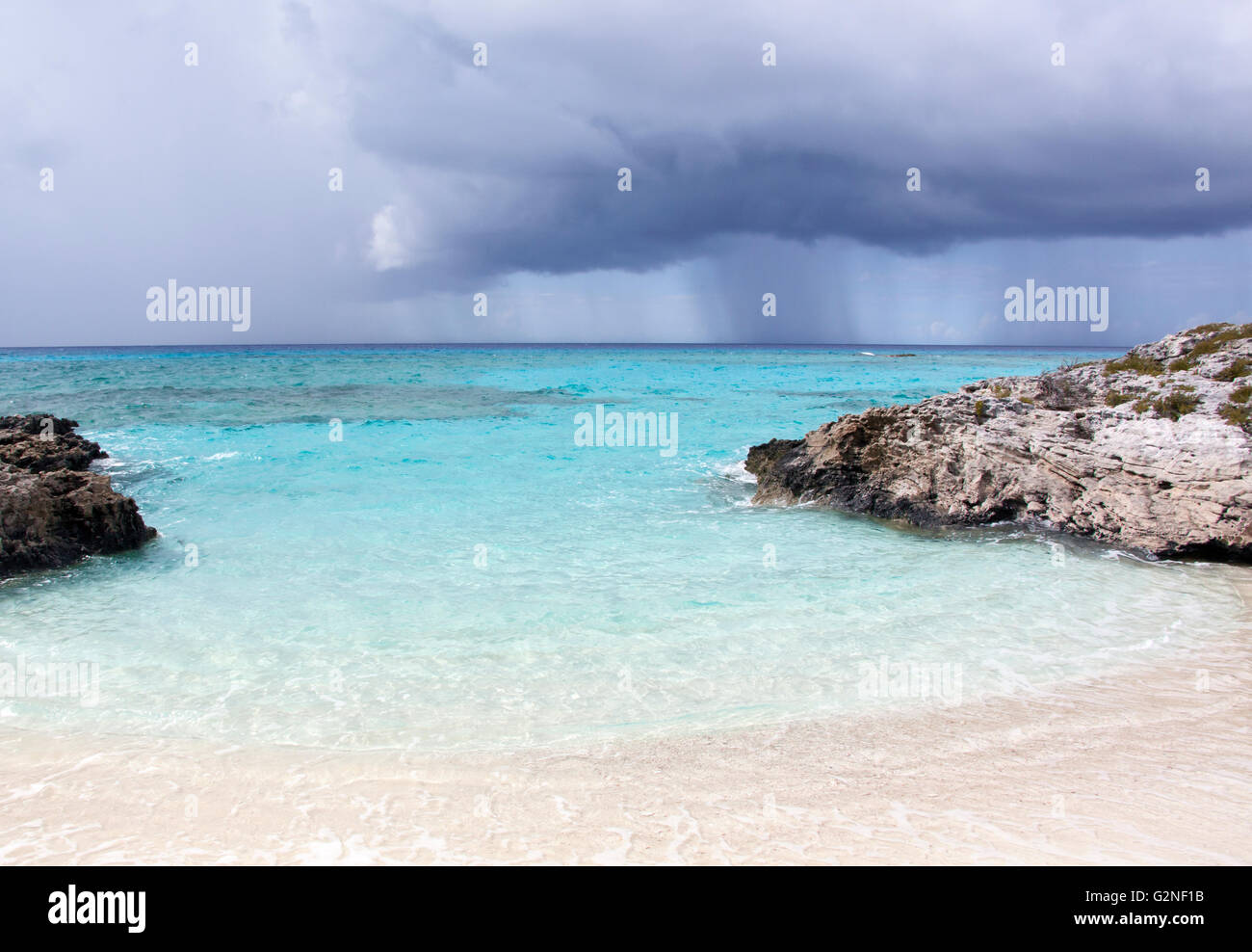 The heavy rain is coming towards Half Moon Cay (The Bahamas Stock Photo ...