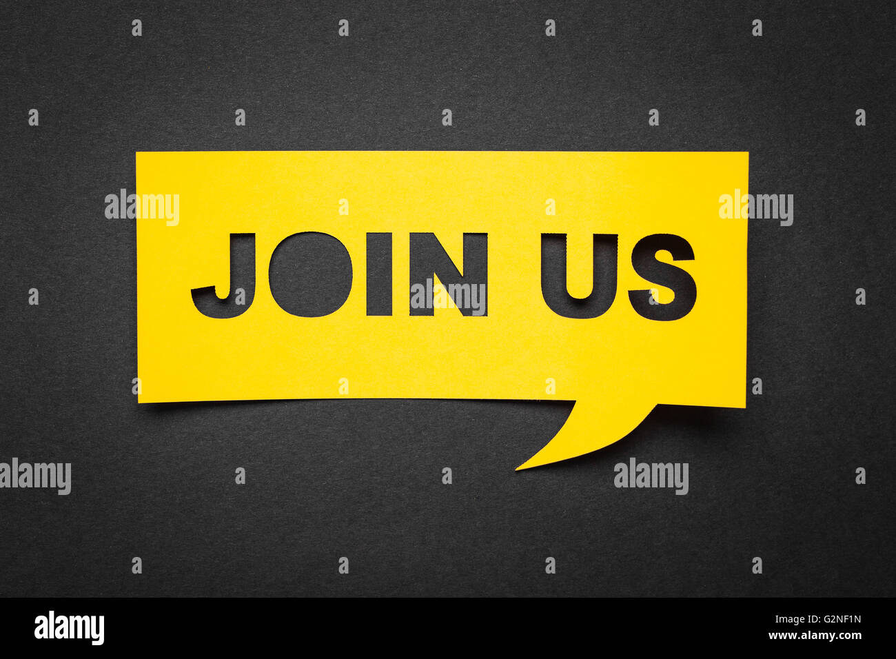 Bubble speech with cut out phrase "join us" in the paper Stock Photo ...