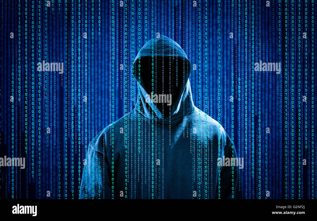 Hacker with a hood and binary code. Hacking the Internet Stock Photo ...