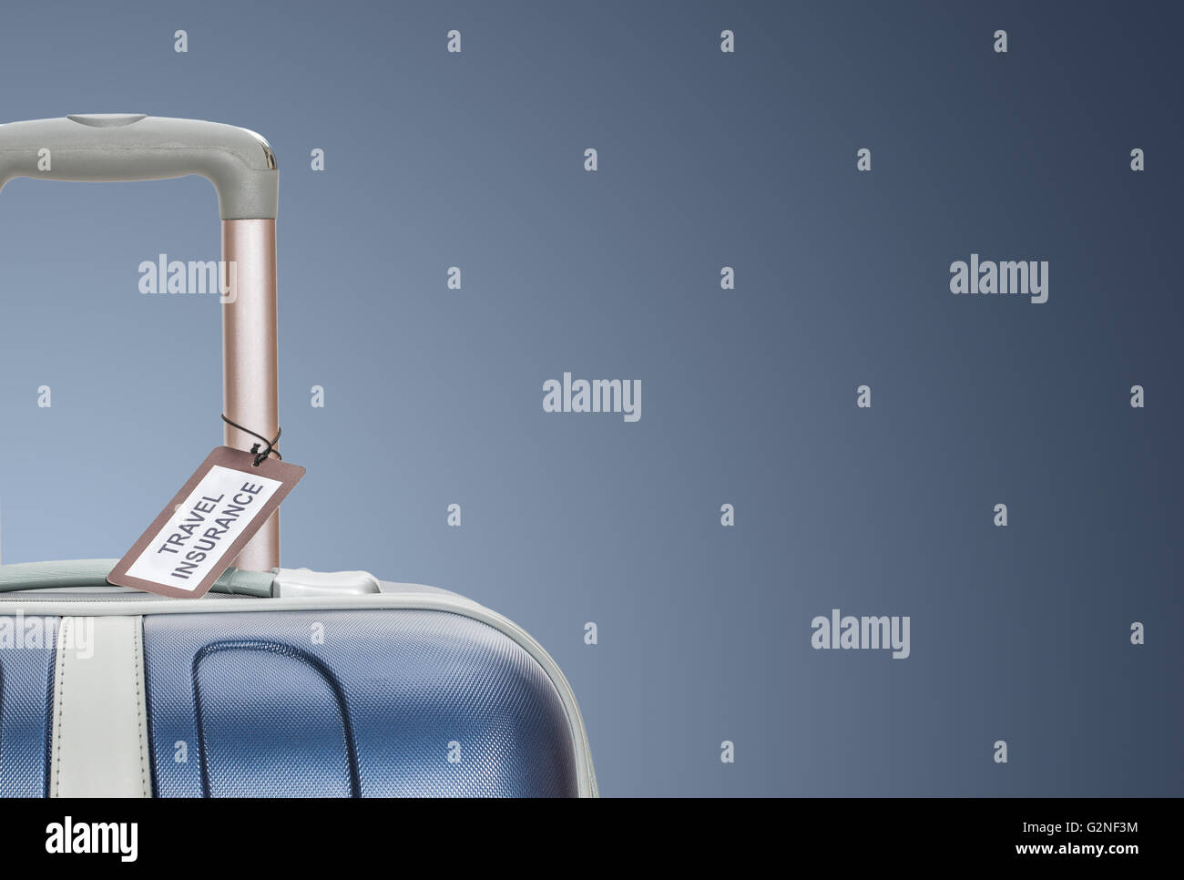 Suitcase with travel insurance label on blue background Stock Photo - Alamy