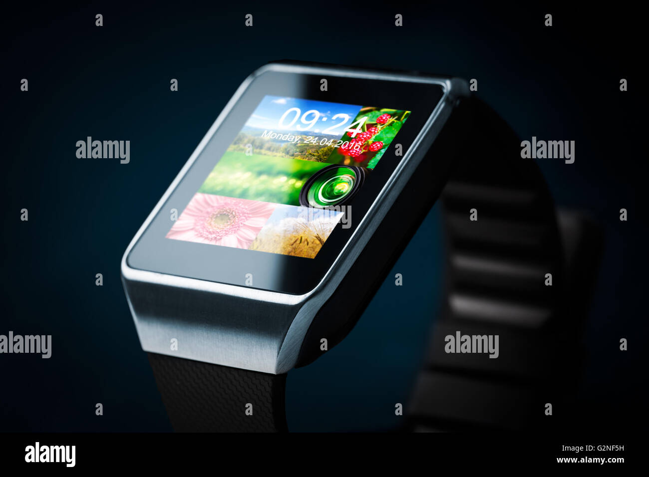 Modern internet smart watch on a black background Stock Photo - Alamy