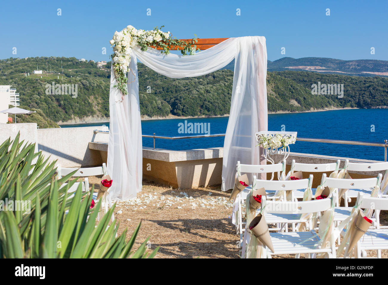 Beautiful wedding arch on the terrace Stock Photo - Alamy