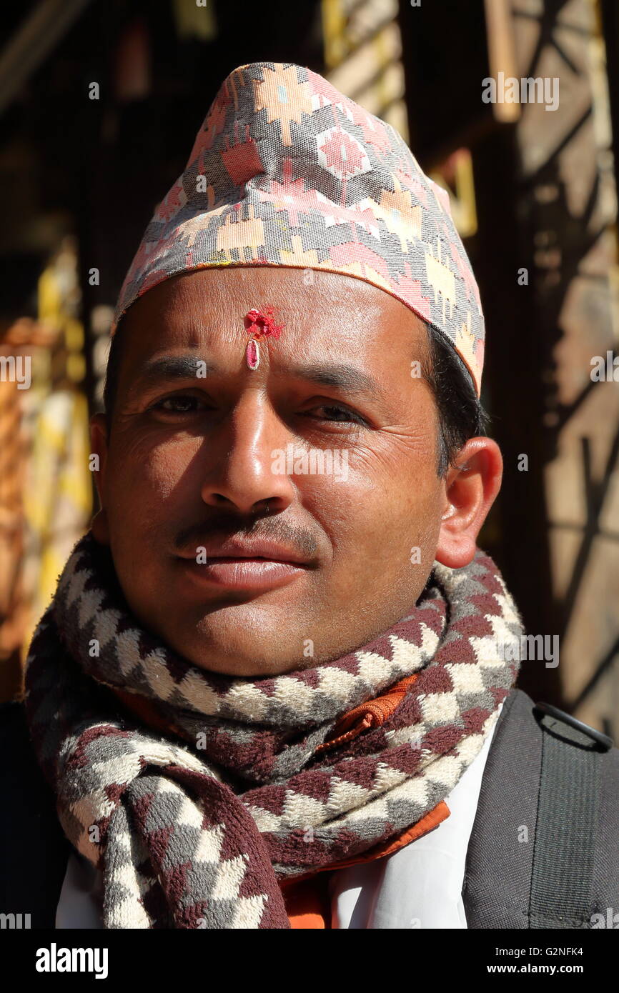 Portrait of a Nepalese man wearing Dhaka Topi (traditional Nepalese hat ...