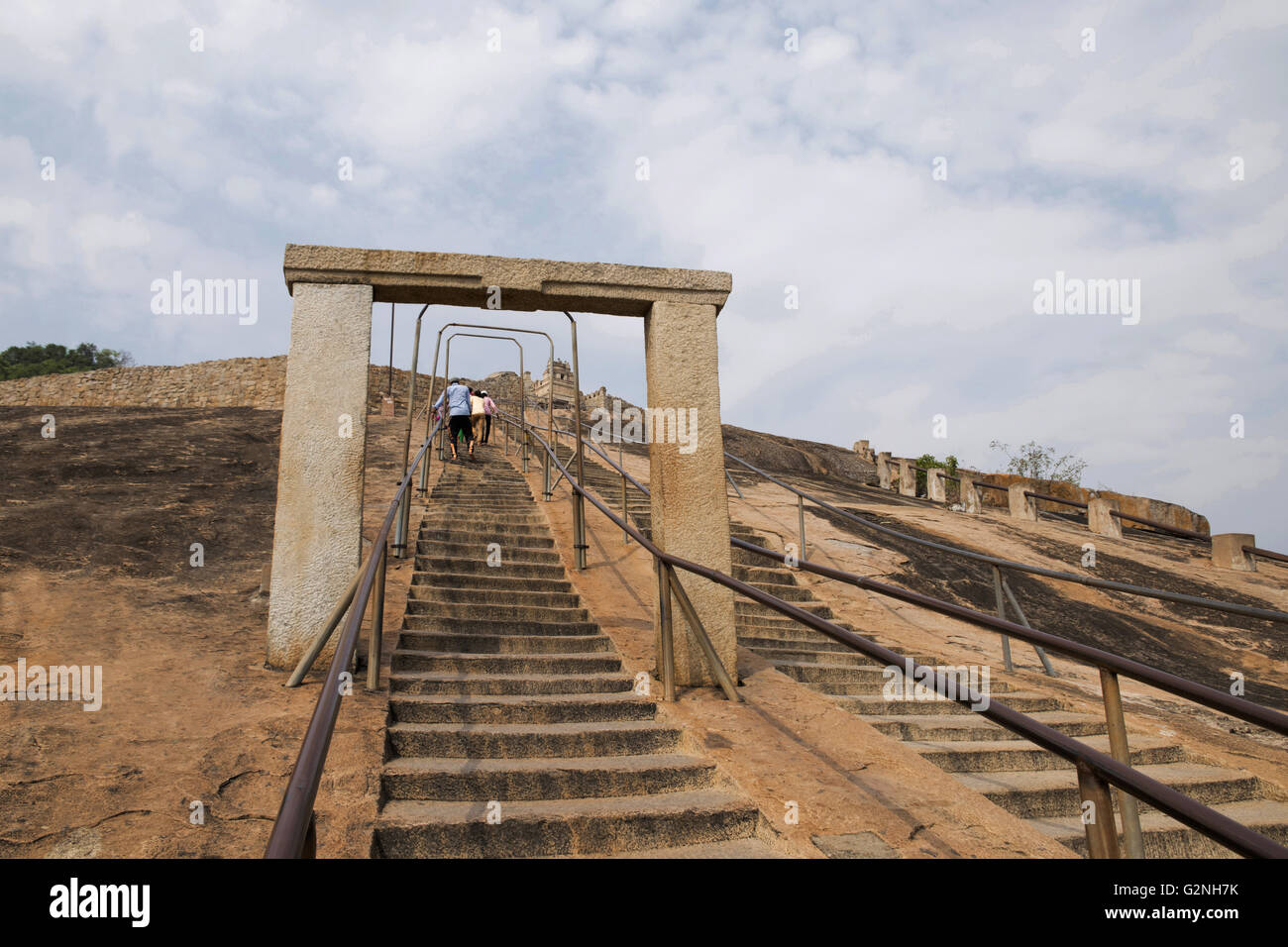 Gateway and rock cut steps leading to the Gomateshwara temple ...