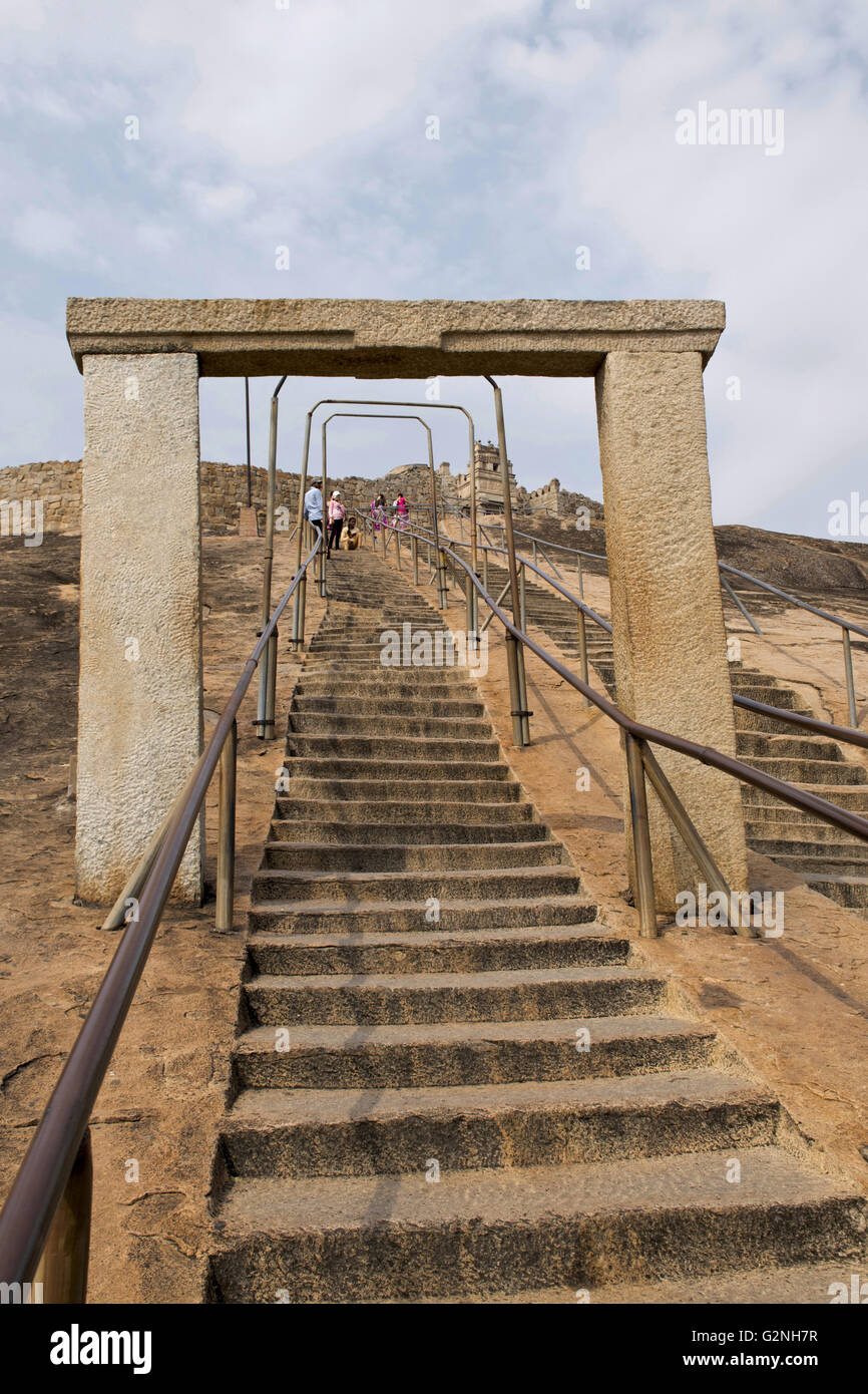 Gateway and rock cut steps leading to the Gomateshwara temple ...
