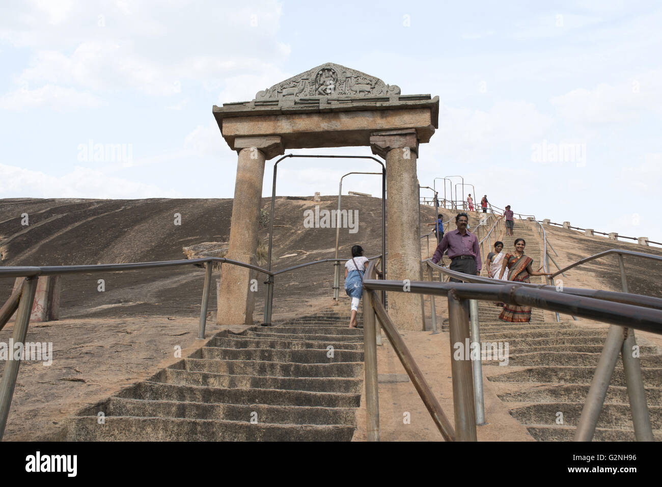 Gateway and rock cut steps leading to the Gomateshwara temple ...