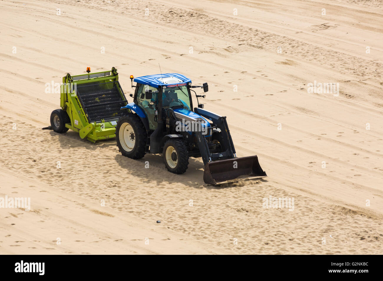 Tractor cleaning beach sand hi-res stock photography and images - Alamy