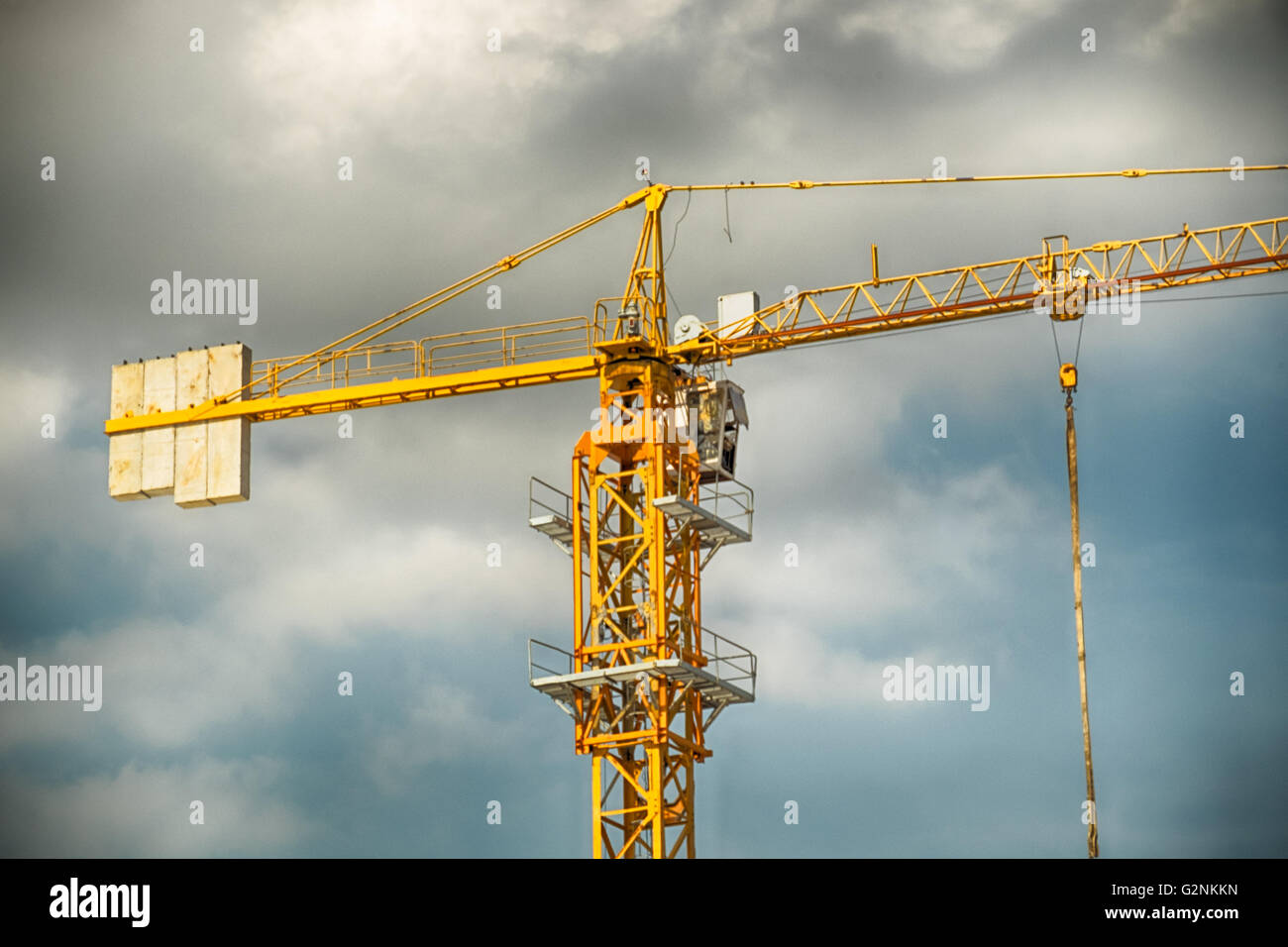 Construction Cranes in Bangkok,Thailand (color effects Stock Photo - Alamy