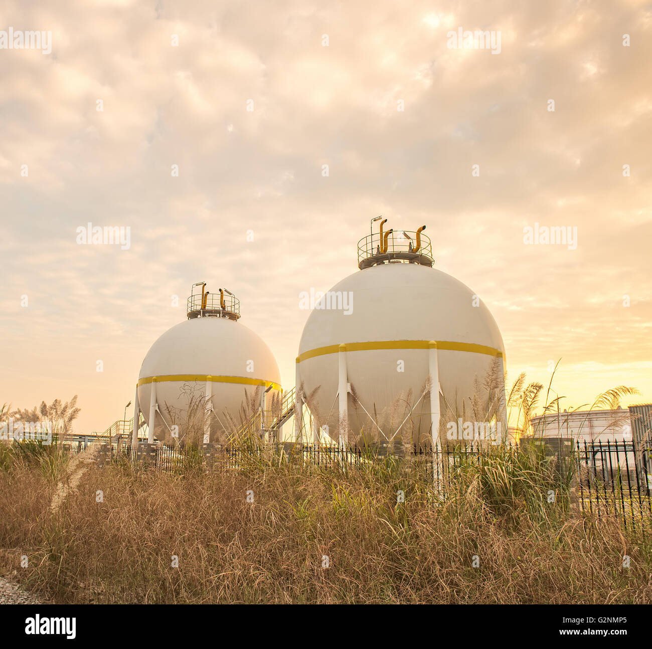 big Industrial oil tanks in a refinery Stock Photo - Alamy