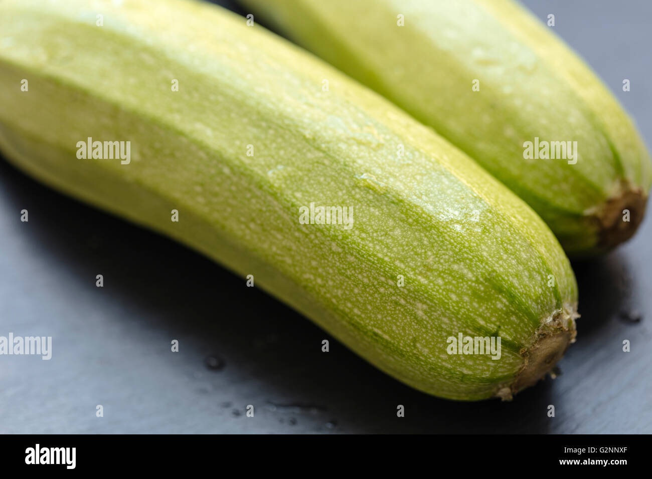 Fresh zucchini on dark hi-res stock photography and images - Alamy