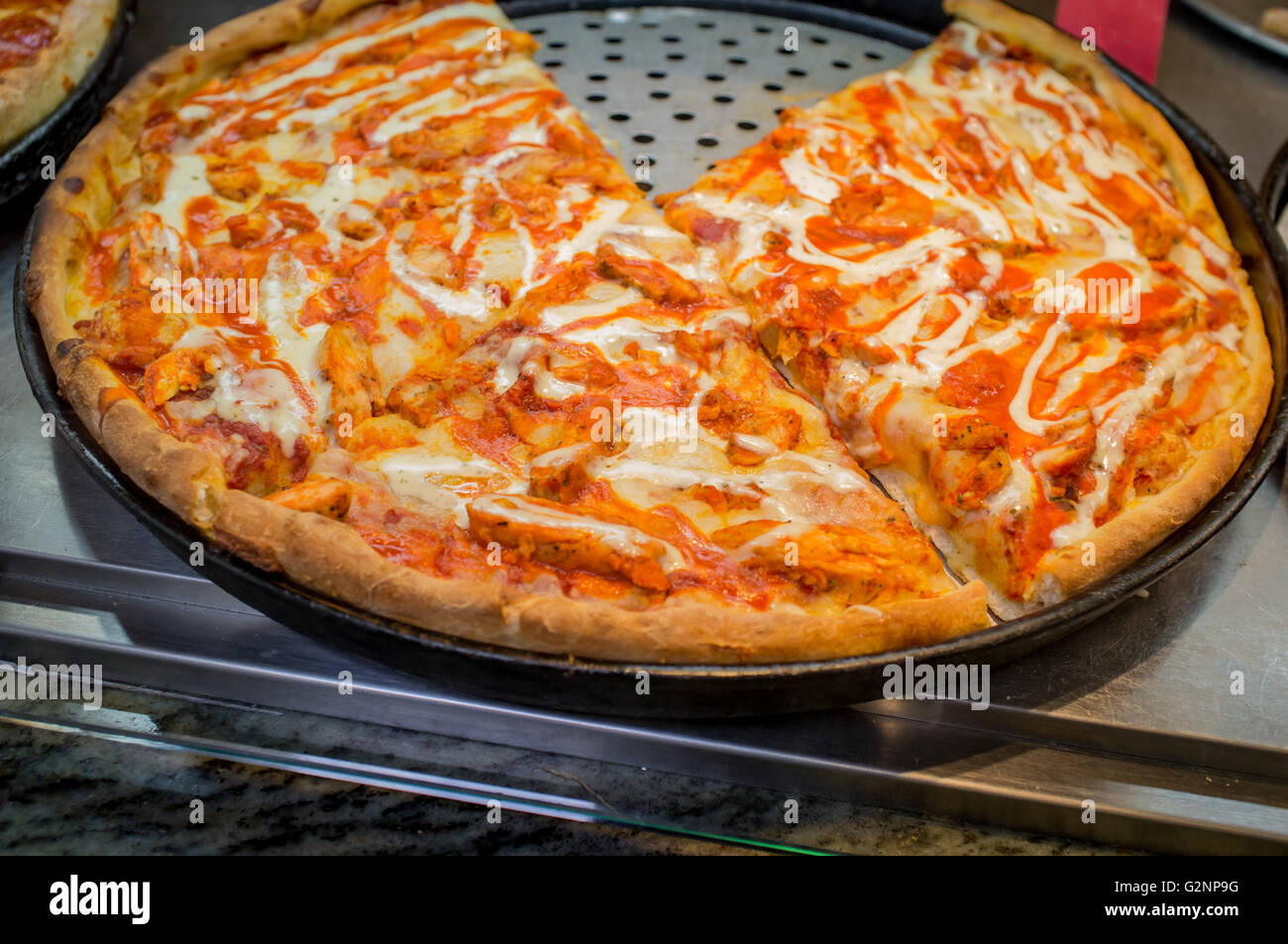 Large slices of buffalo chicken pizza New York pizzeria restaurant ...