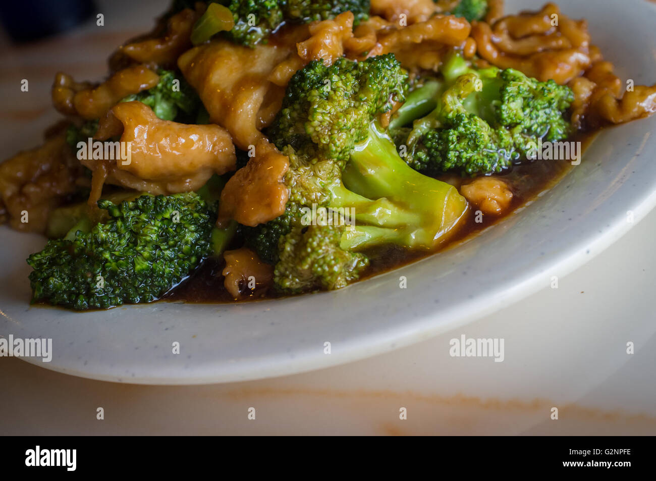 Chinese food chicken and broccoli take out with chopsticks Stock Photo ...