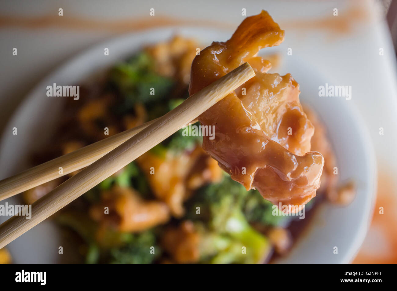 Chinese food chicken and broccoli take out with chopsticks Stock Photo ...