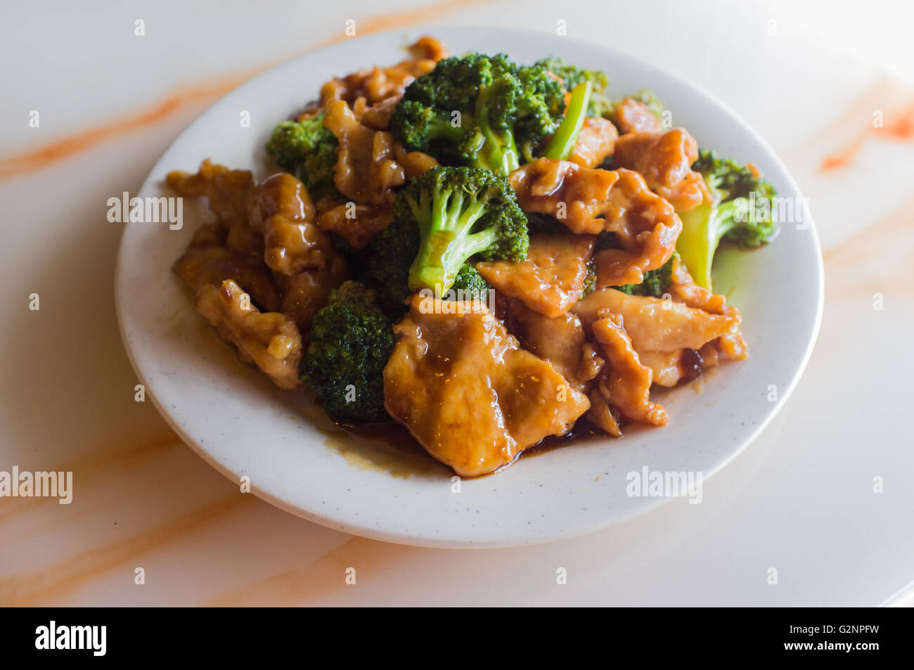 Chinese food chicken and broccoli take out with chopsticks Stock Photo ...