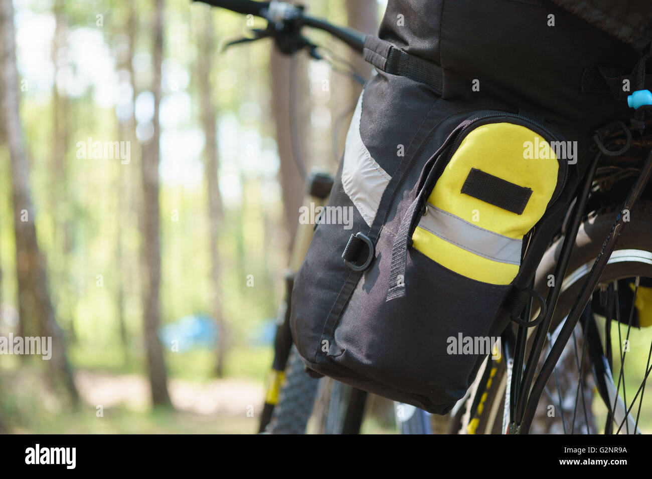 Bicycle tourist with loaded bike Stock Photo - Alamy