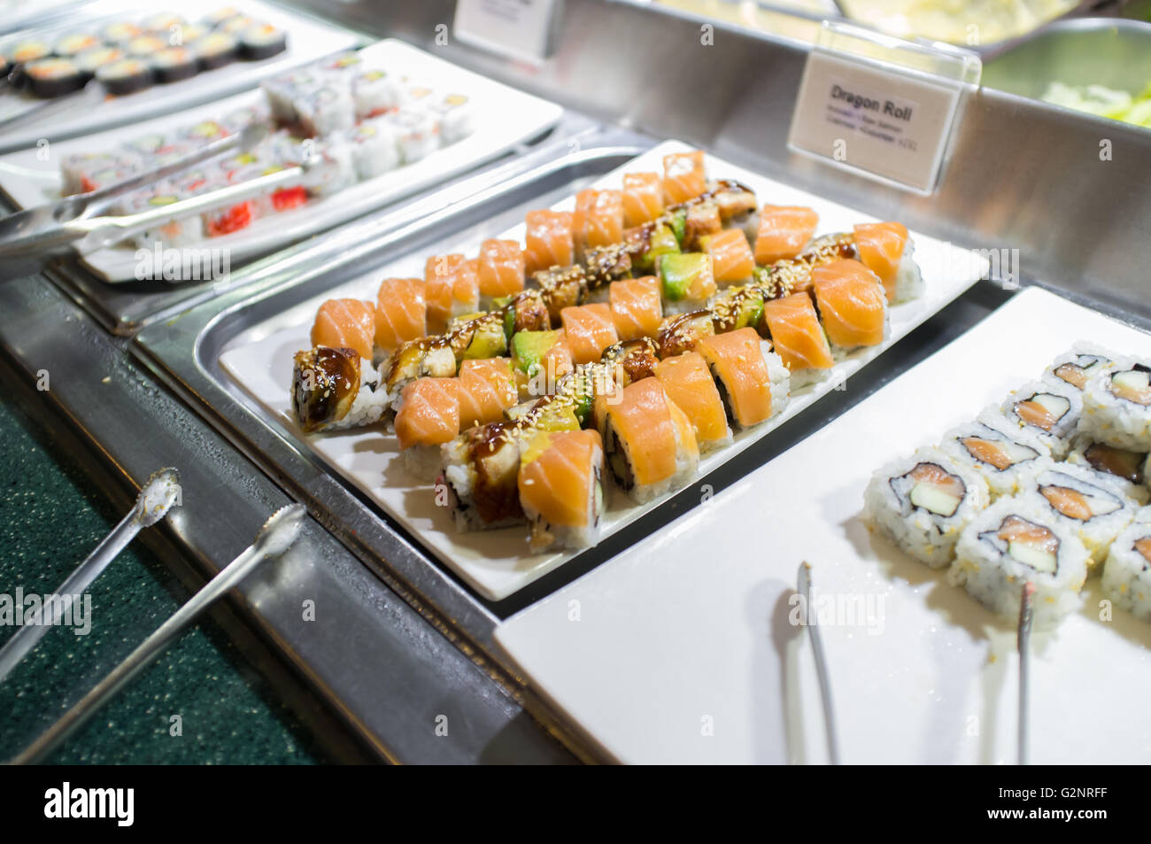Various sushi buffet rolls at self serve station Stock Photo - Alamy