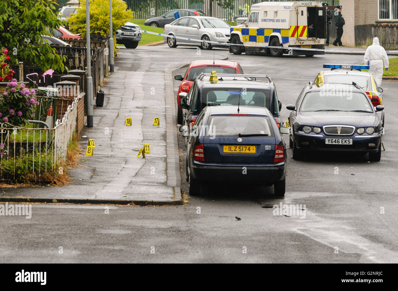 Belfast, 06/06/2012 - Forensics Officers map out the scene where a pipe ...
