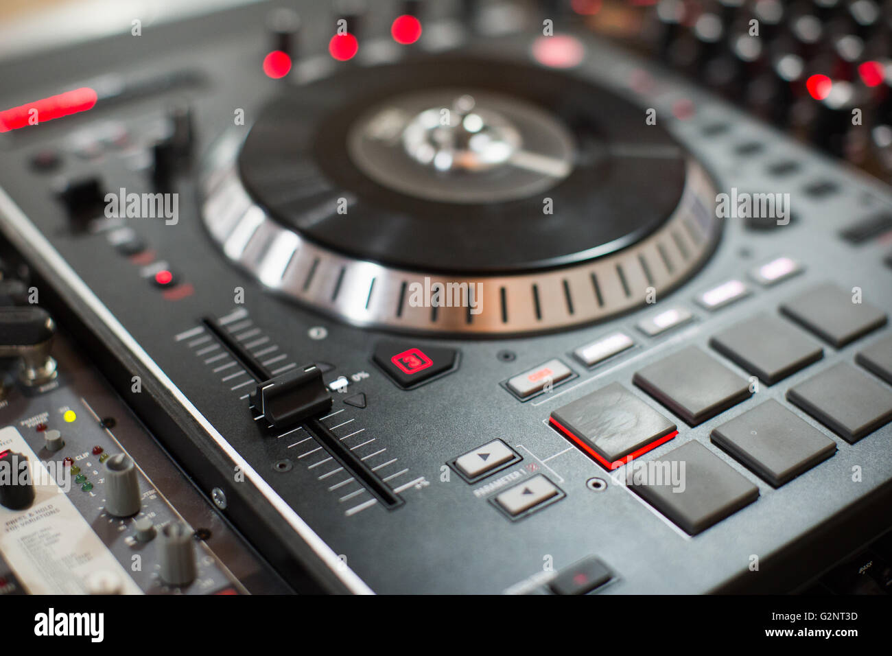 DJ playing mixing music on vinyl turntable at party Stock Photo - Alamy