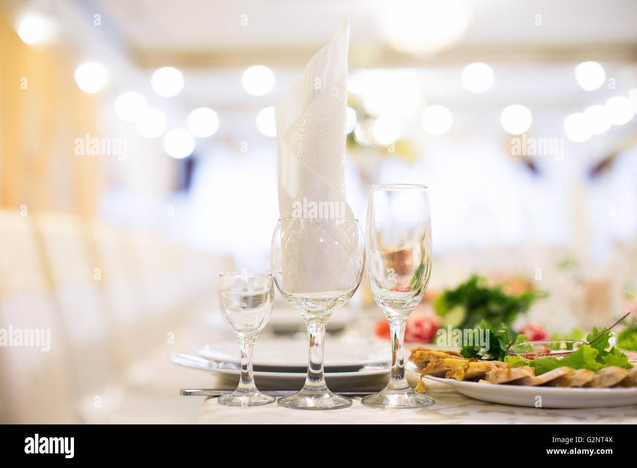 Banquet wedding table setting on evening reception Stock Photo - Alamy