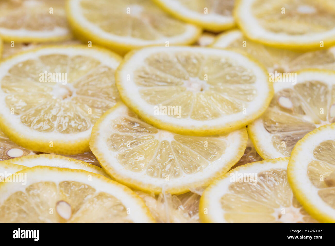 background made with slices of lemon Stock Photo - Alamy