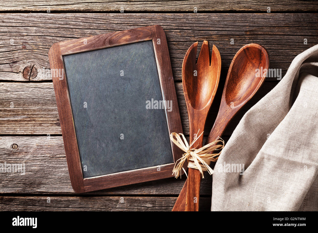 Blackboard for your text and cooking utensils. Top view with copy space ...