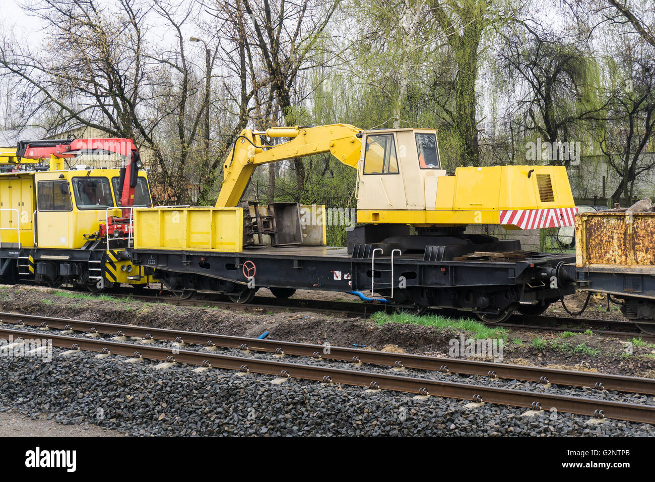 special railway wagon - excavator Stock Photo - Alamy