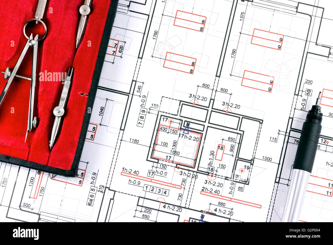 Architect's workspace with construction plan and drawing tools Stock ...