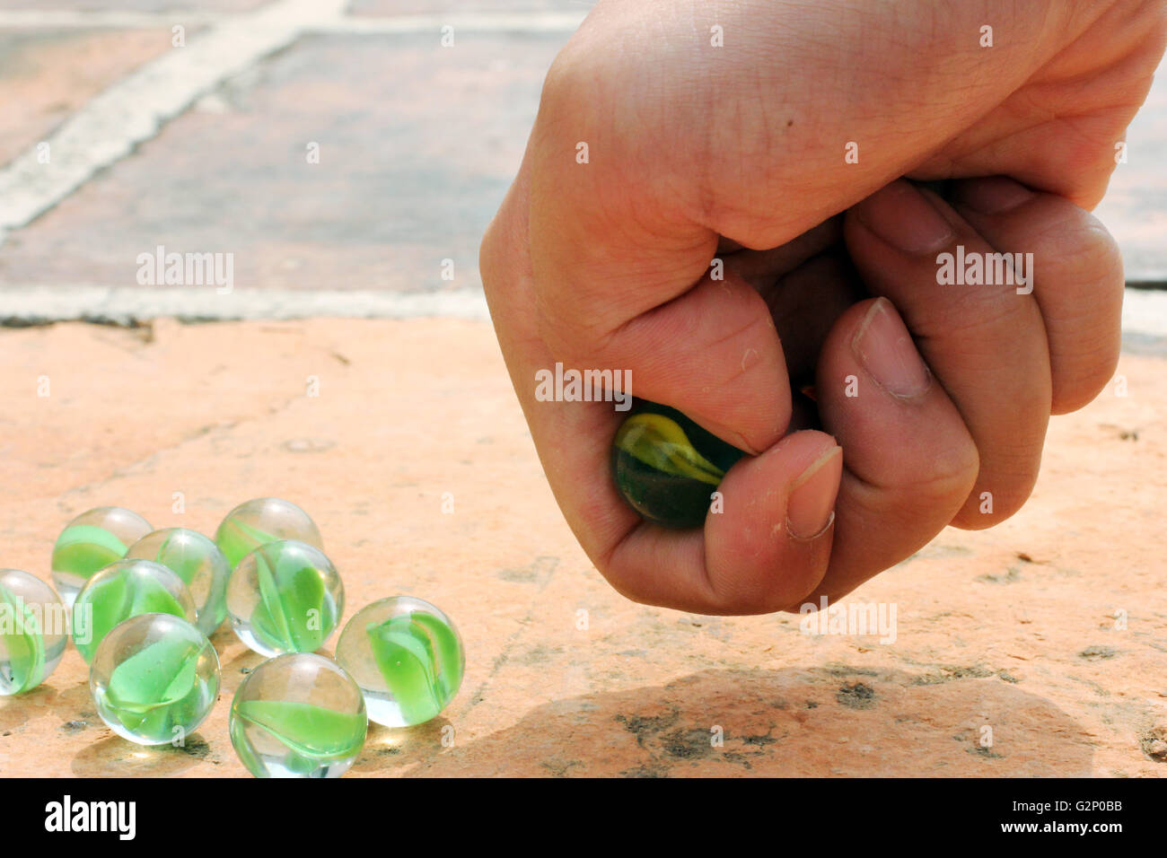 Play marbles hi-res stock photography and images - Alamy