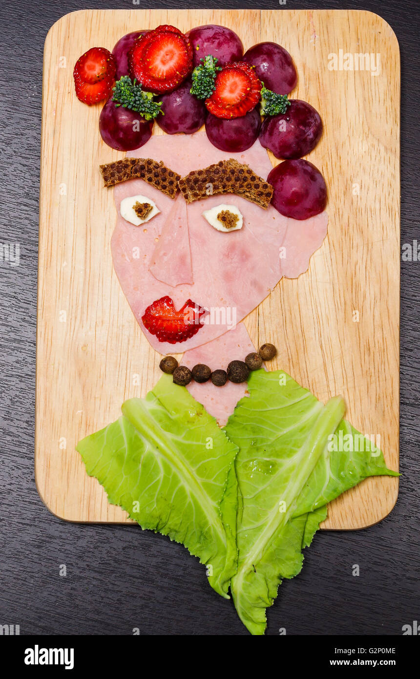 Face portrait made from various sliced grocery products, artistic food ...