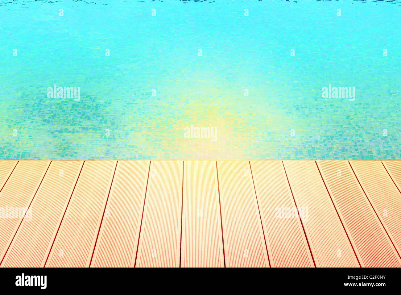 Planks with sun shining down on the swimming pool Stock Photo - Alamy