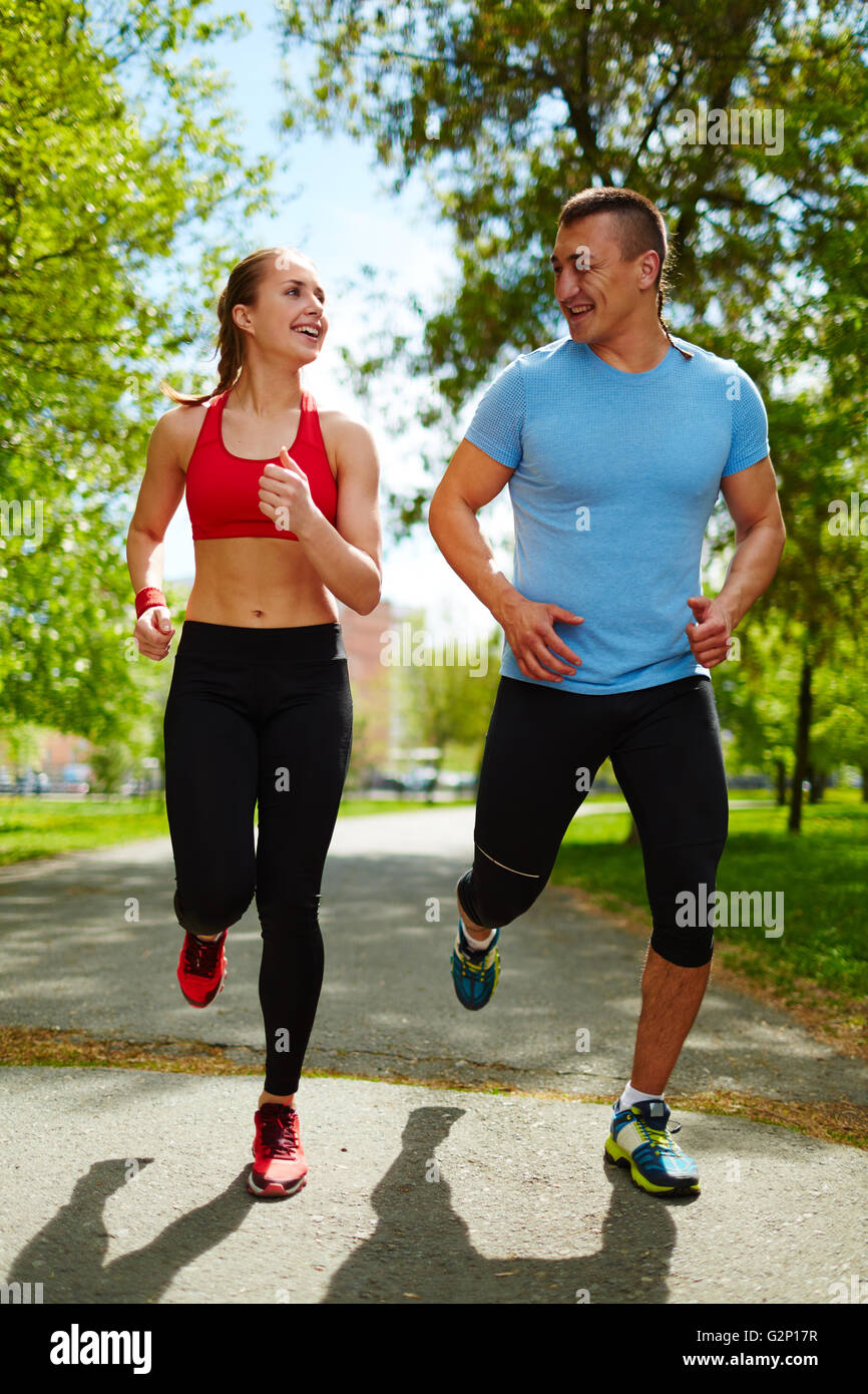 Jogging couple young man woman hi-res stock photography and images - Alamy