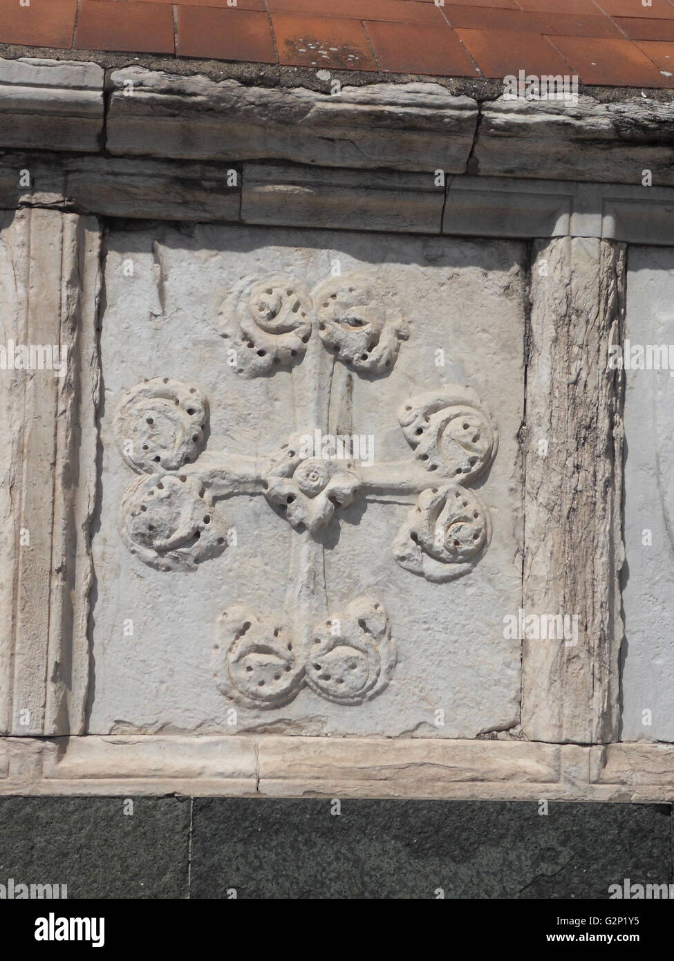 External detail from a church in Florence, Italy. Stonework reliefs ...