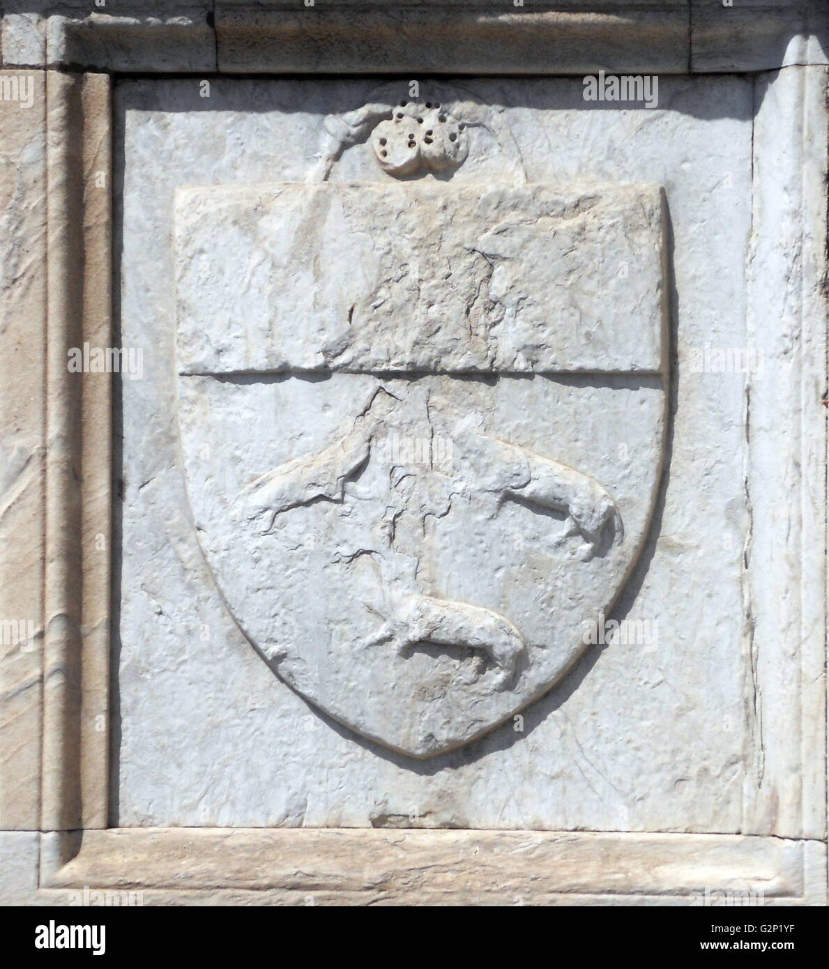 External detail from a church in Florence, Italy. Stonework reliefs ...