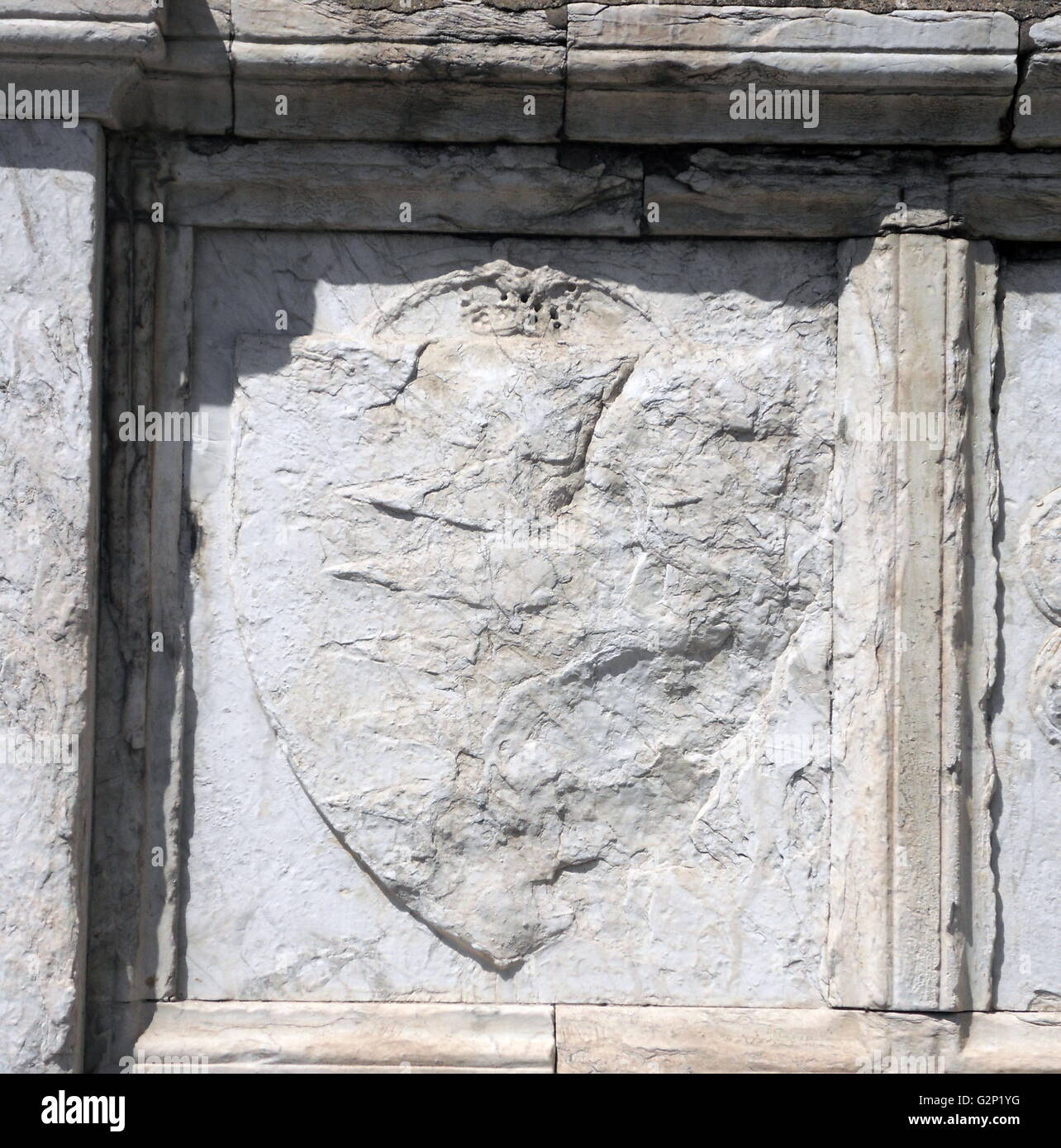 External detail from a church in Florence, Italy. Stonework reliefs ...